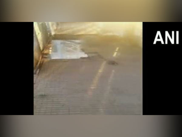 Four people injured after slabs of foot-over bridge collapse at ...