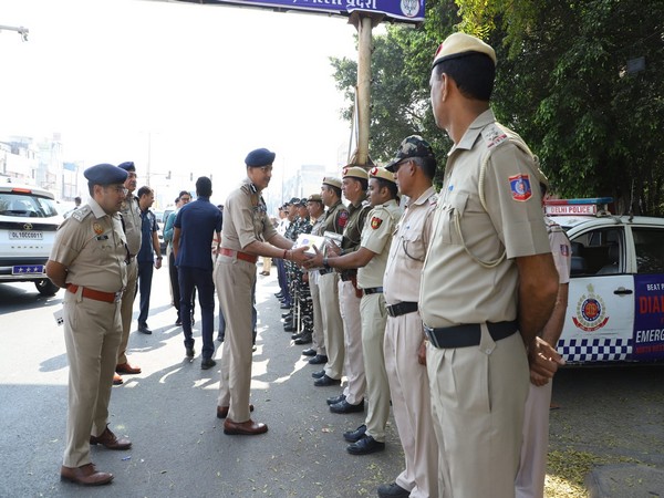Commissioner meets North-West district cops on Holi, distributes sweets