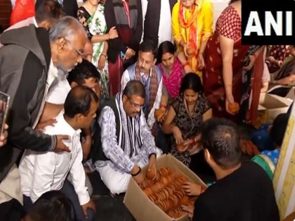 Odisha: Dharmendra Pradhan takes part in earthen lamp preparation for ...