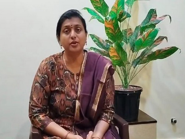 Andhra Pradesh: Former Minister RK Roja protests with a flower in her ...