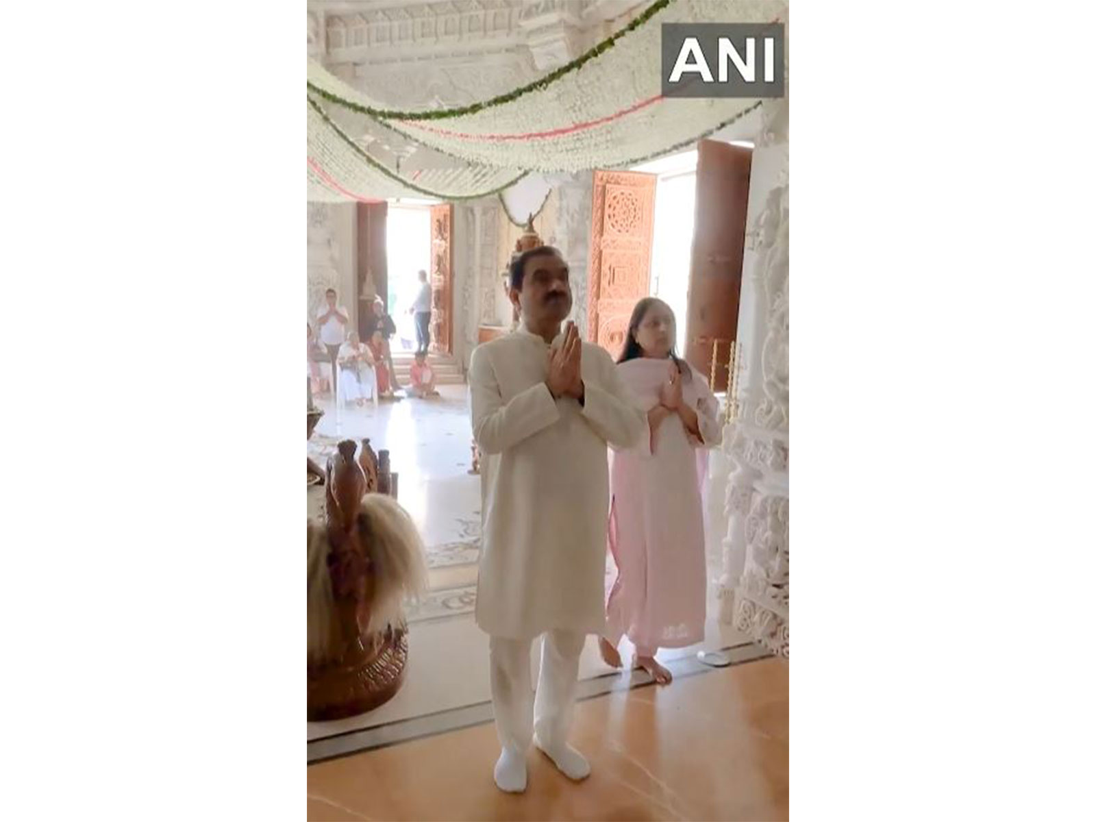 Gautam Adani offers prayers at Jain temple in Ahmedabad, a day after ...