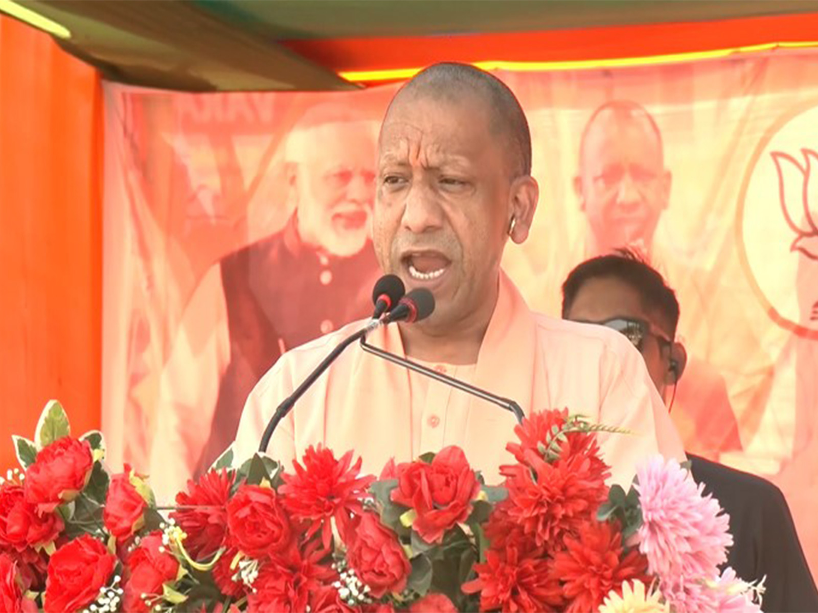 "RJD, Congress trying to deceive people of Bihar": Yogi Adityanath in ...