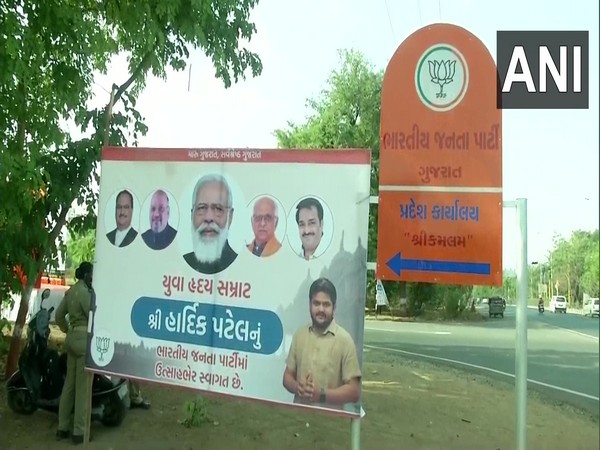 Posters seen outside BJP office in Gandhinagar welcoming Hardik Patel ...