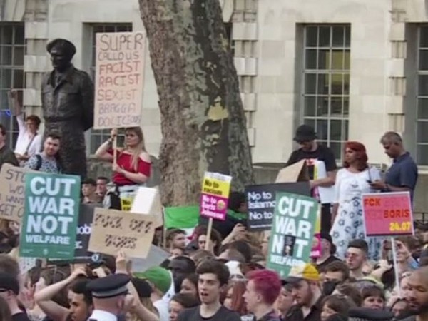 UK: Hundreds gather in central London to protest against Johnson's ...