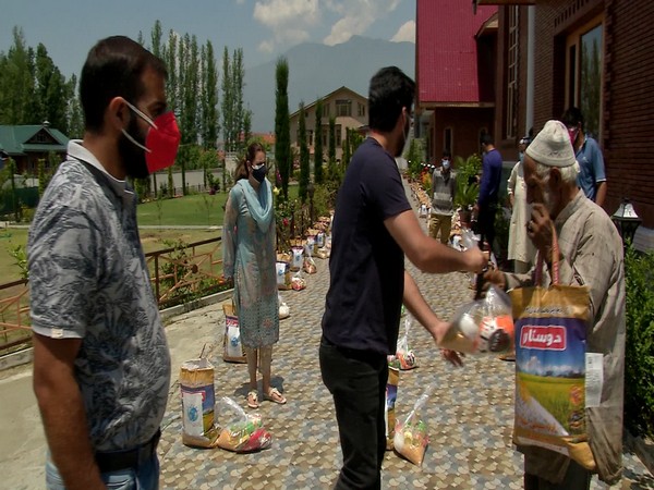 NGOs distribute food kits to needy during lockdown in Srinagar