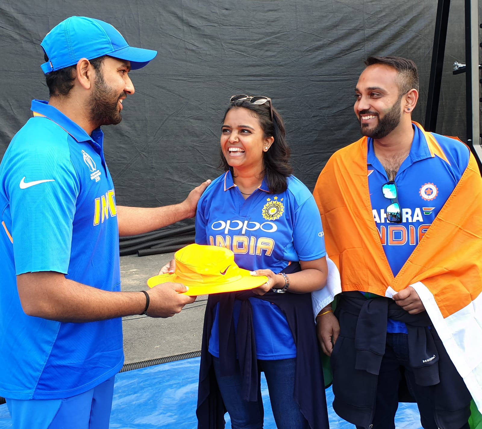 Rohit Sharma presents autographed hat to fan, who was hit by ball