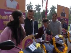 MP CM Mohan Yadav distributes free e-scooters to 7900 meritorious govt ...
