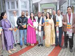 Author Priya Sharma presents book 'The Light He Left Behind' to HP CM ...