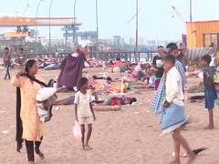 Mumbai residents sleep on Versova beach to escape extreme heat