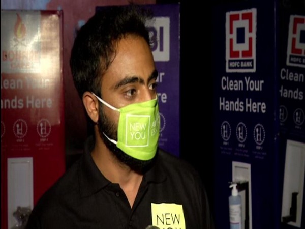 Stand developed by Srinagar bizman dispenses sanitiser using foot ...