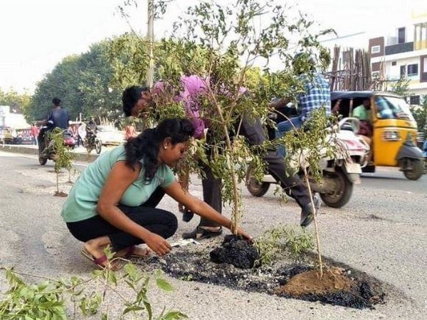 Hyderabad: Locals stage protest by planting trees inside potholes on roads